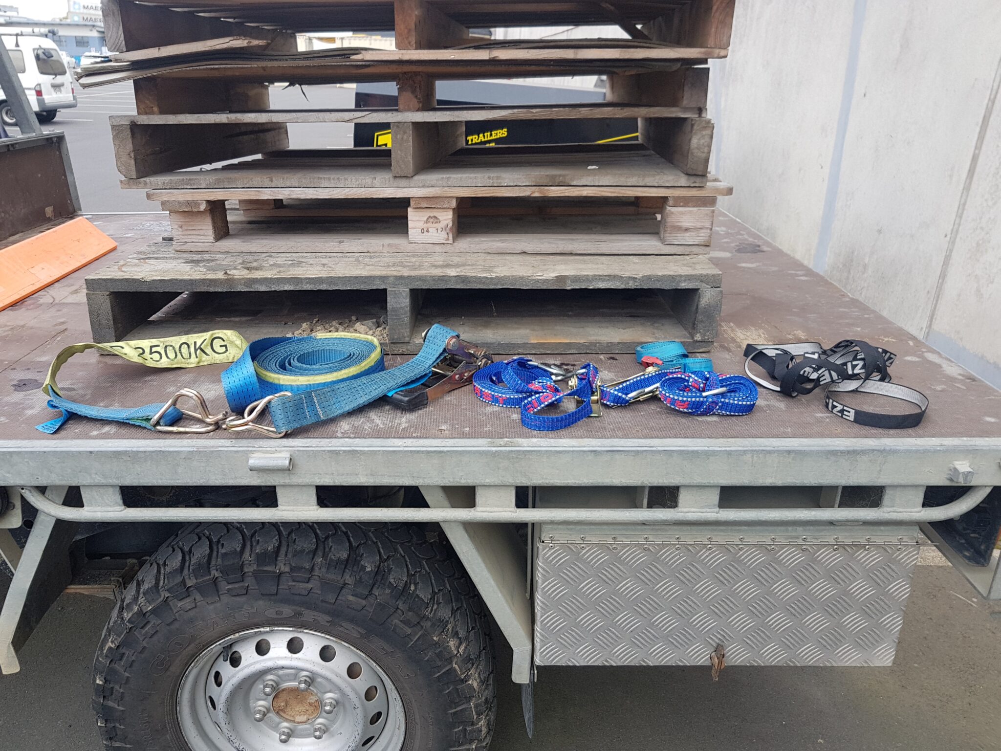 How can you safely load a ute or pickup truck?
