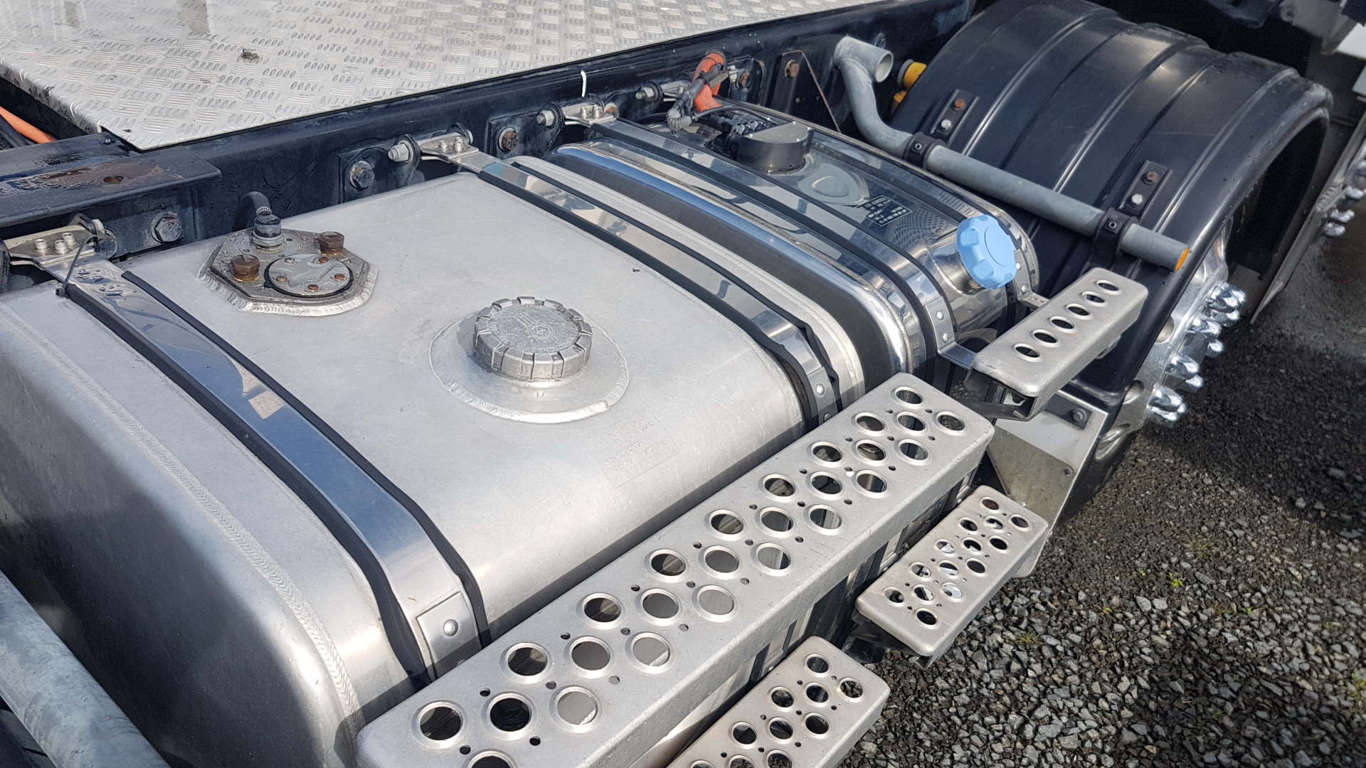 What is diesel exhaust fluid (AdBlue) and why is it used?