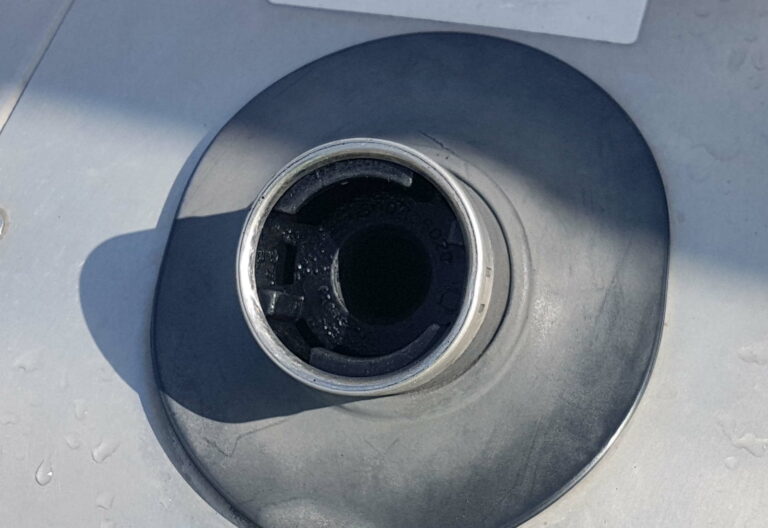 What is diesel exhaust fluid (AdBlue) and why is it used?