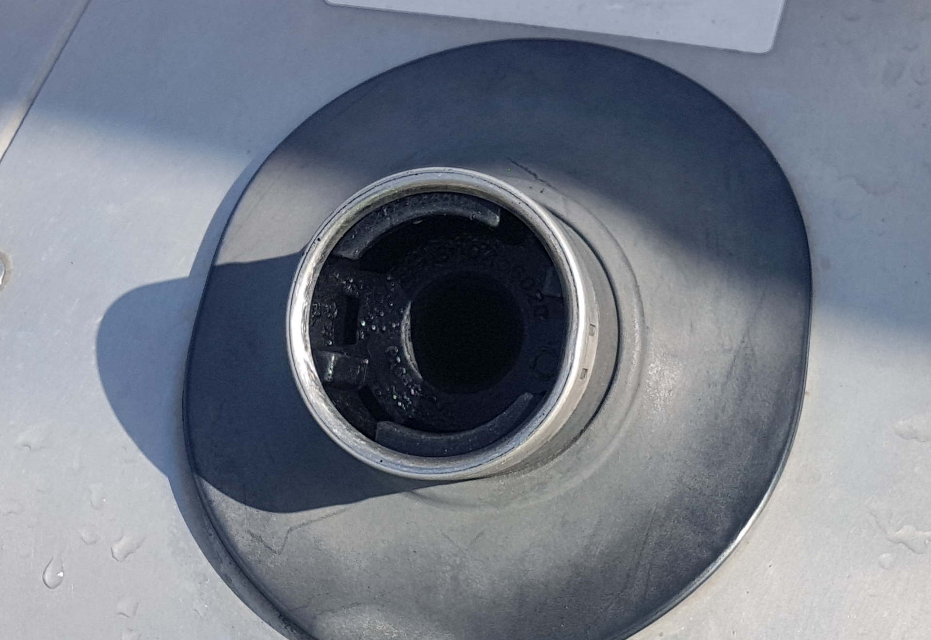 What is diesel exhaust fluid (AdBlue) and why is it used?