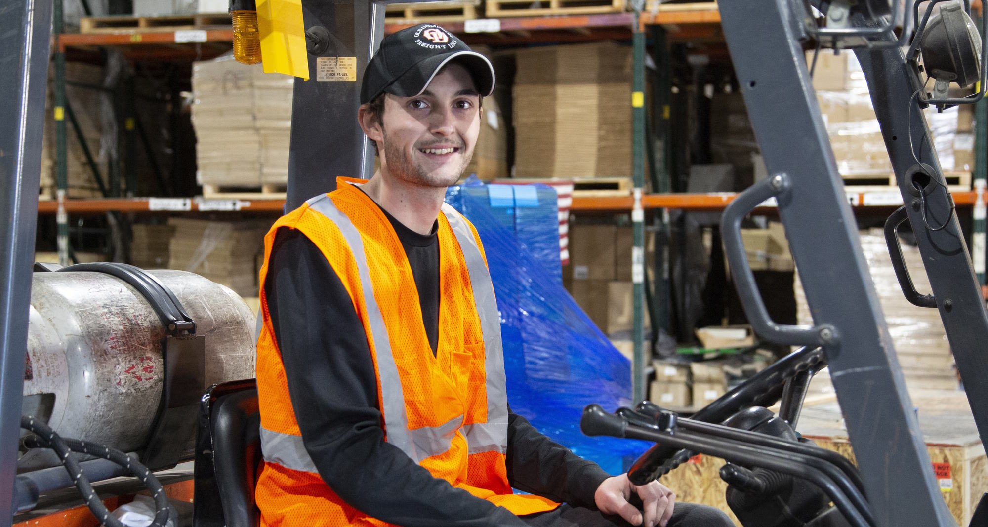 Should forklift operators wear a hat while working?