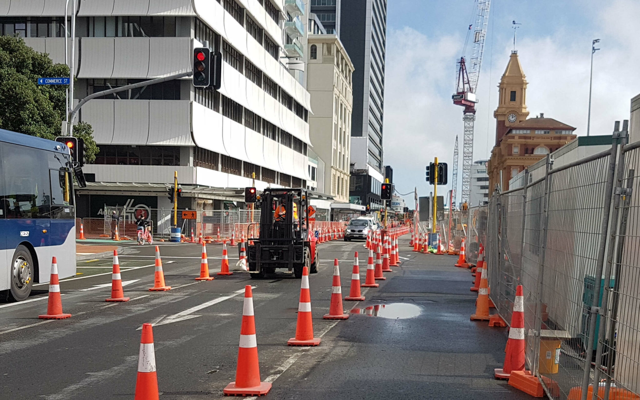 How do you safely drive a forklift on the road?